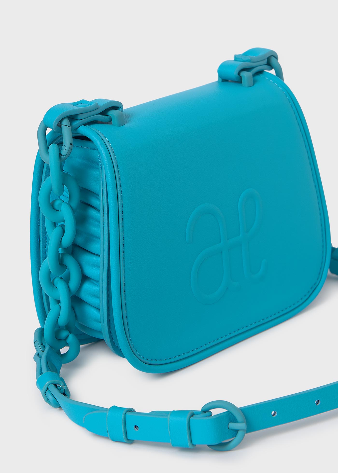 Girl logo embossed bag Turquoise | Abel & Lula